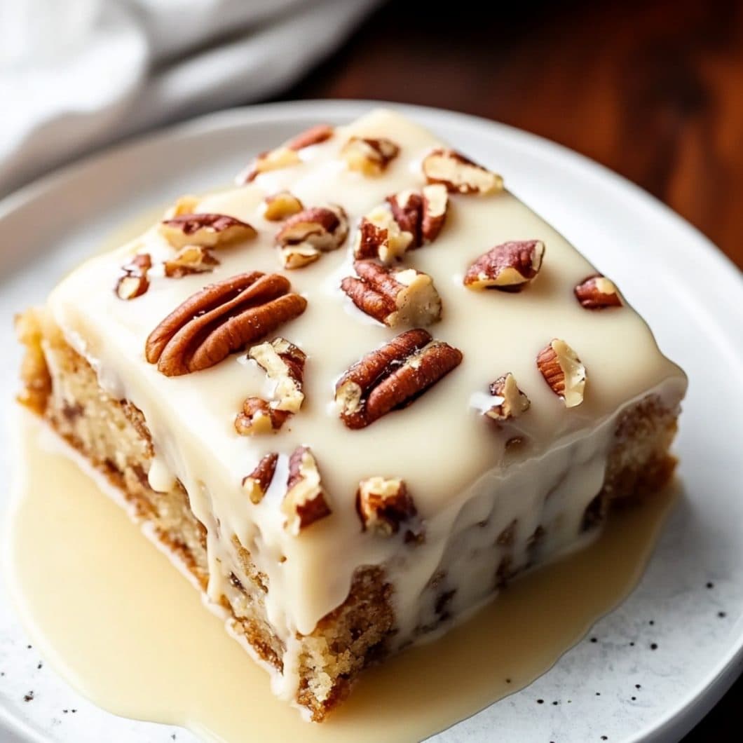 Butter Pecan Praline Poke Cake - Insanely Good